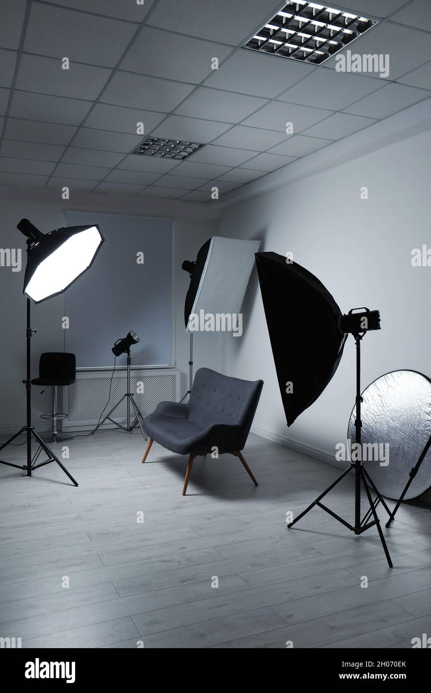 Modern photo studio with professional lighting equipment Stock Photo ...