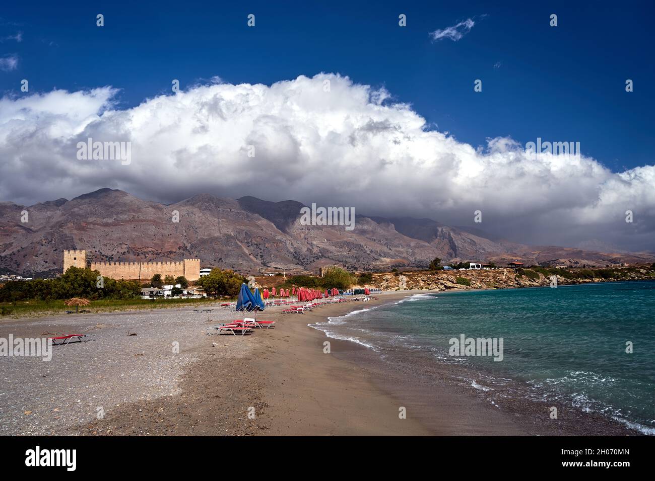 beach and walls of the medieval Venetian castle of Frangokastello on ...
