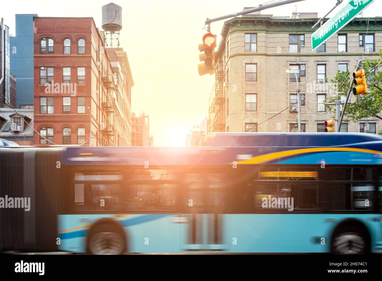 NYC bus driving across Rivington Street in the Lower East Side ...