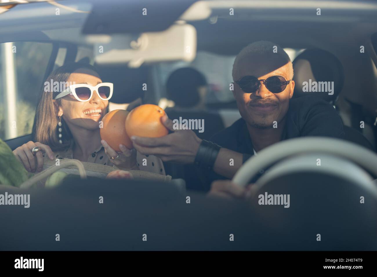 Family riding in car together hi-res stock photography and images - Alamy