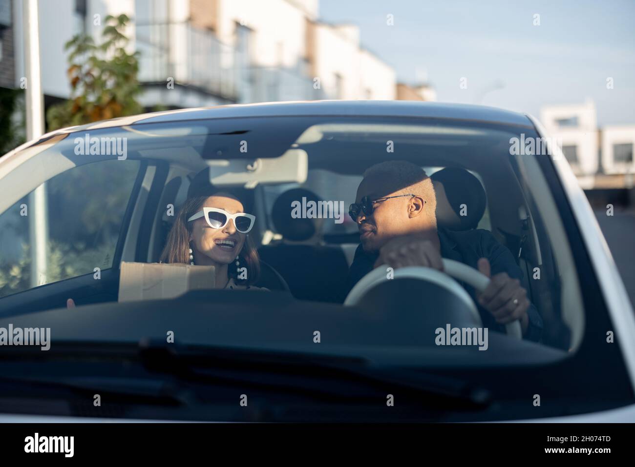 Family riding in car together hi-res stock photography and images - Alamy