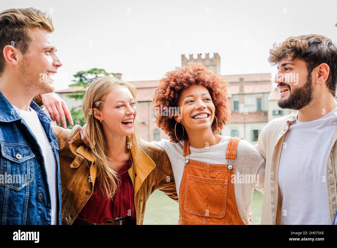 Group of friends happy laughing together - Group of multiracial guys ...