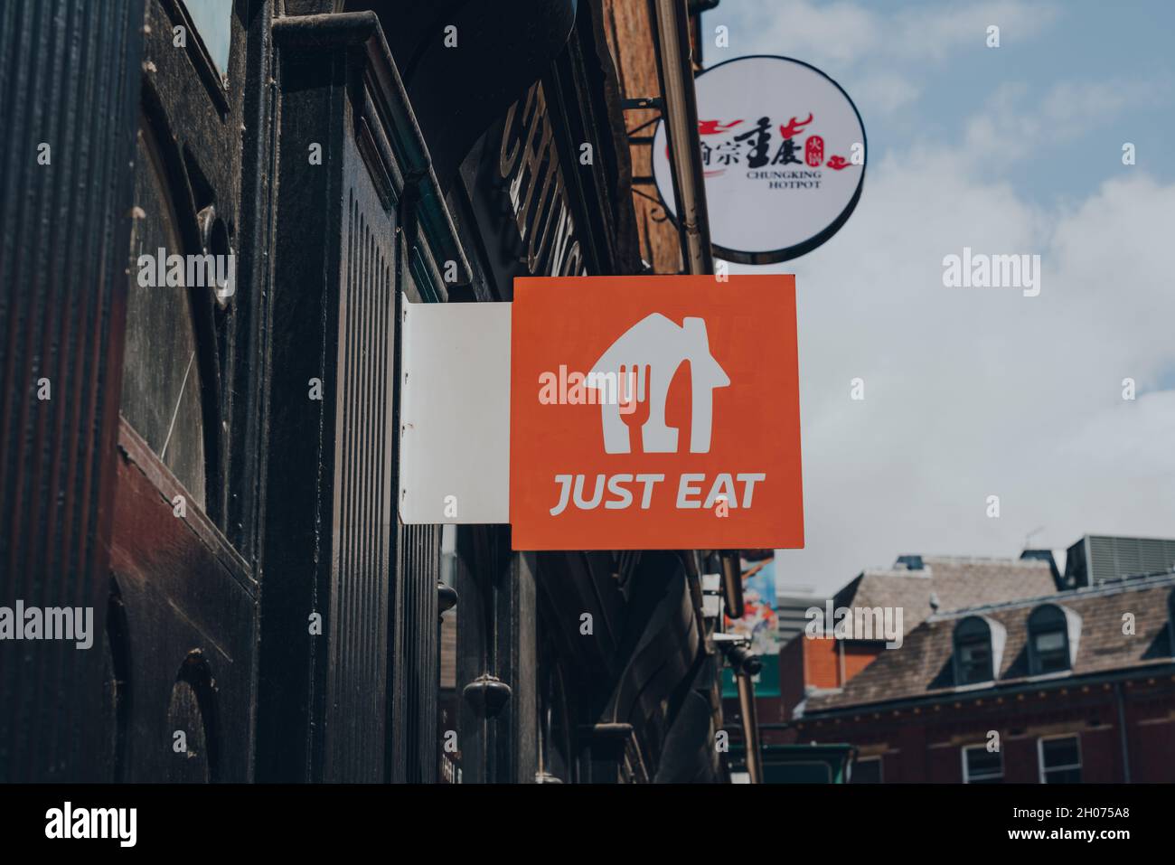 York, UK - June 22, 2021: Just Eat sign outside a restaurant in York ...