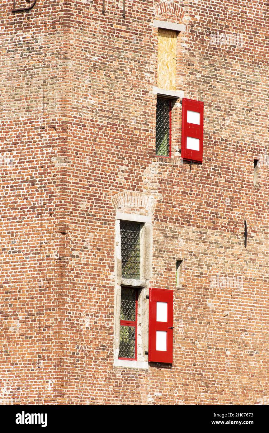 Closeup of a medieval wall with open windows at castle Bergh in th ...