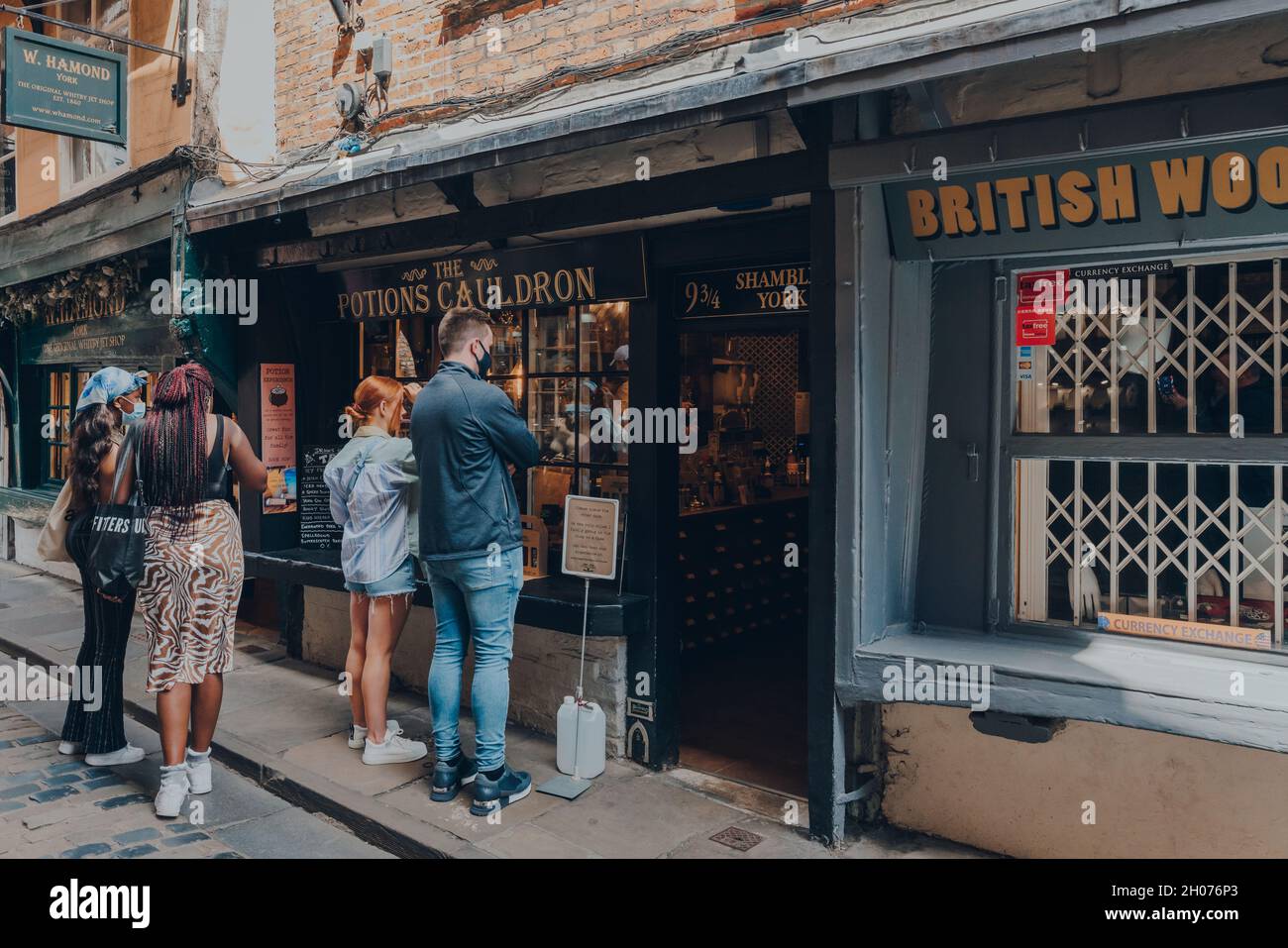 York, UK - June 22, 2021: People outside The Potions Cauldron on ...