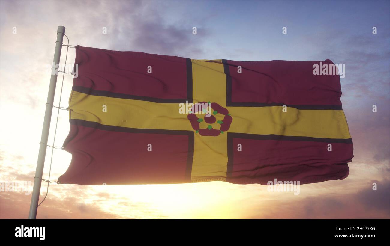 Northamptonshire flag, England, waving in the wind, sky and sun ...