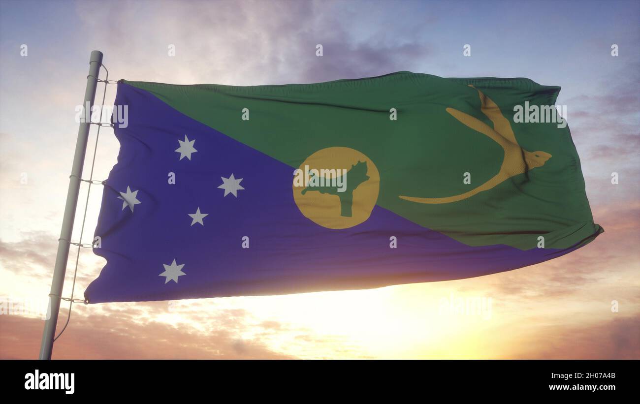 Flag of Christmas Island waving in the wind, sky and sun background. 3d ...