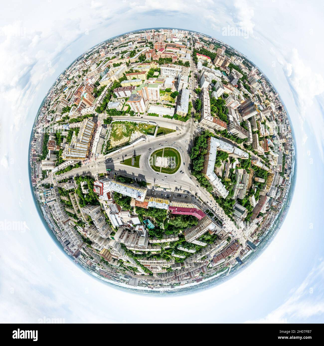 Aerial city view with crossroads and roads, houses, buildings, parks ...