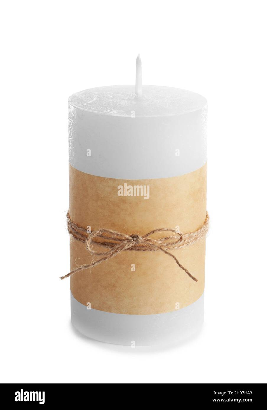 New wax candle decorated with parchment on white background Stock Photo ...