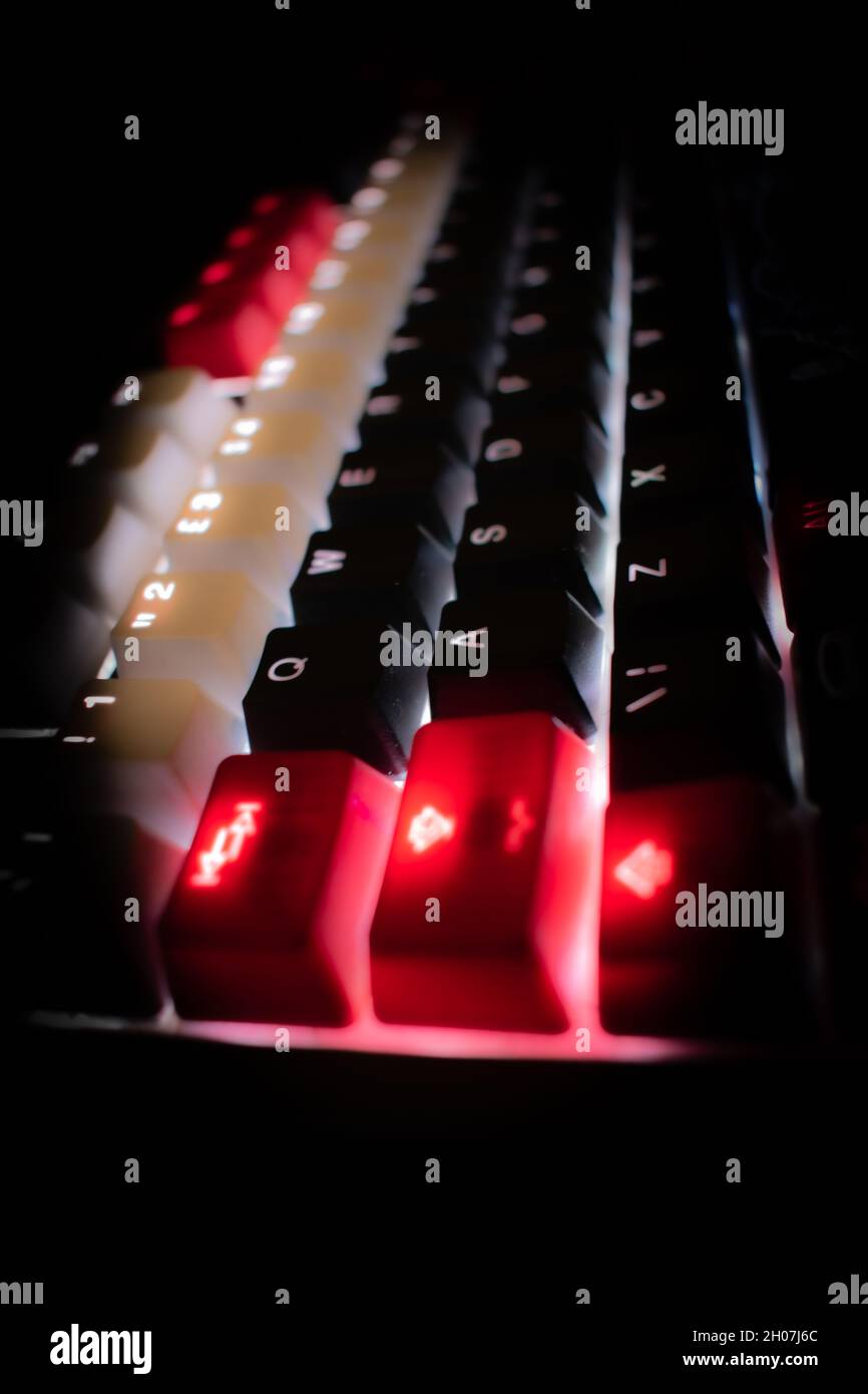 White Backlit Mechanical Keyboard with black, white, red keycaps at an ...