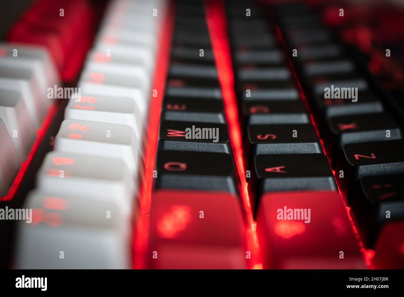 Red Backlit Mechanical Keyboard with black, white, red keycaps at an ...