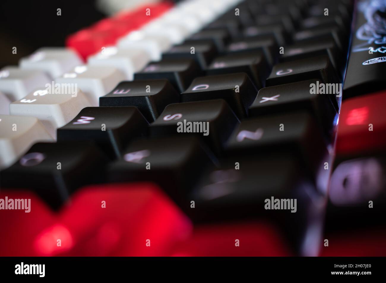 White Backlit Mechanical Keyboard with black, white, red keycaps at an ...