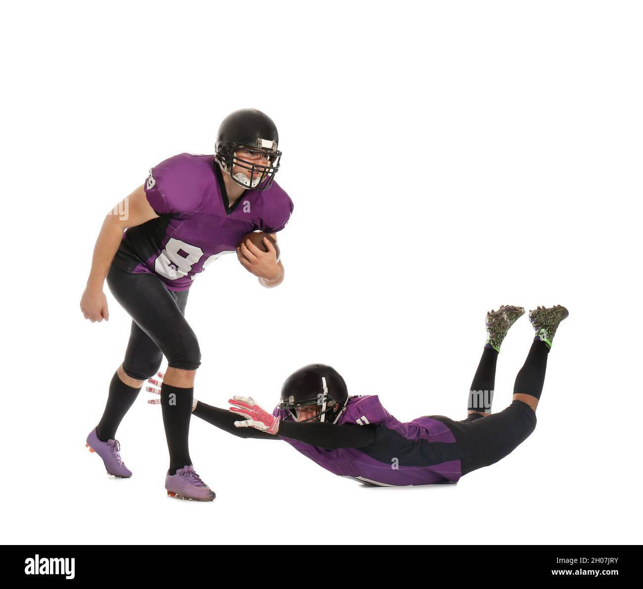 Men in uniform playing American football on white background Stock ...