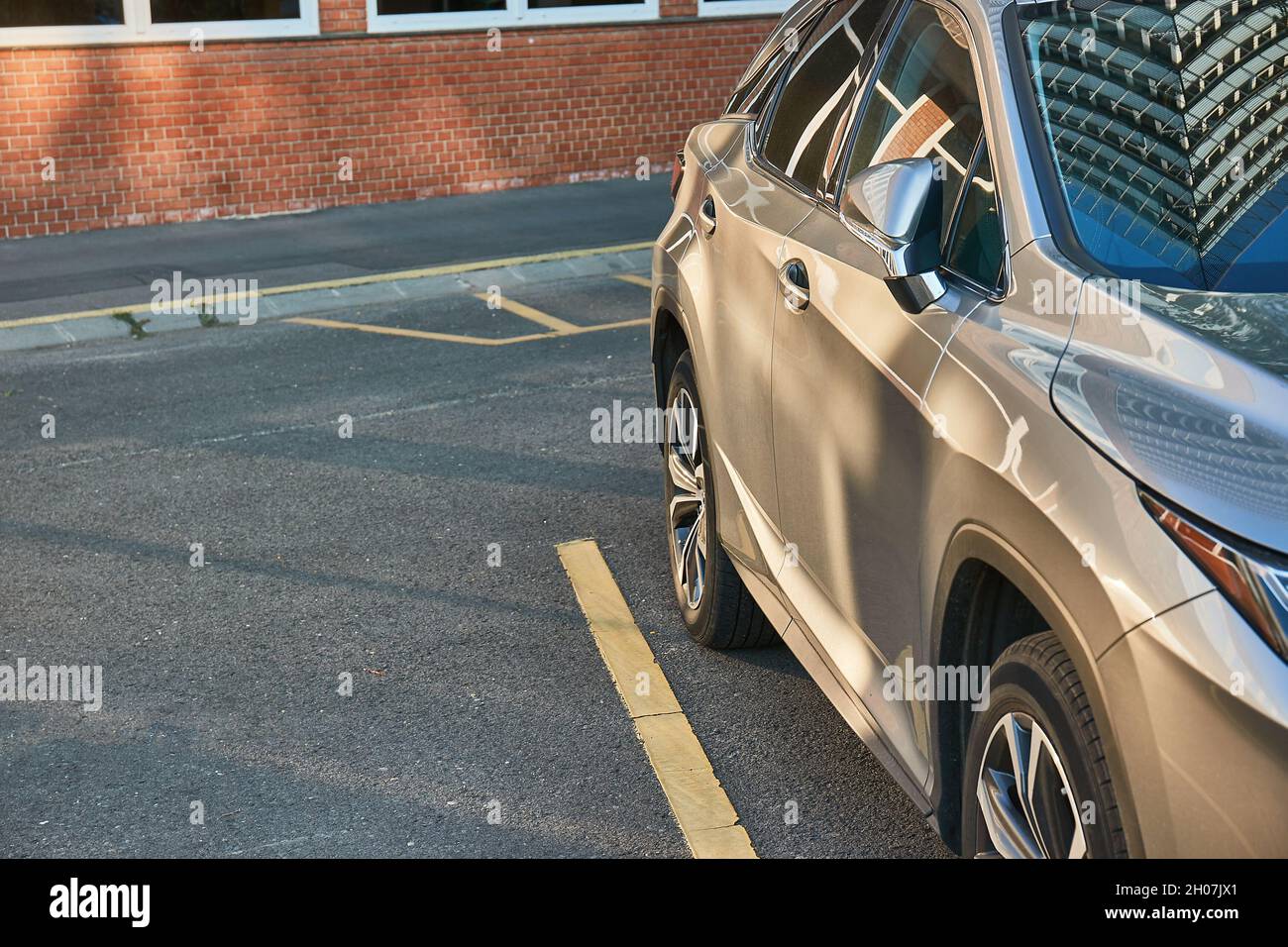 Cars Parking in town, free spot Stock Photo - Alamy