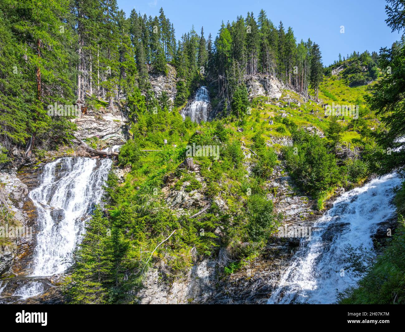 Two waterfalls in Austrian Alps. Tauernbach and Dichtenbach waterfalls ...