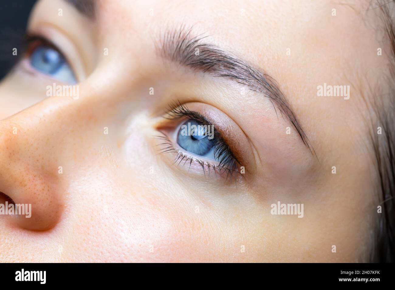 photo after performing the procedure of eyelash tattooing and eyelid ...