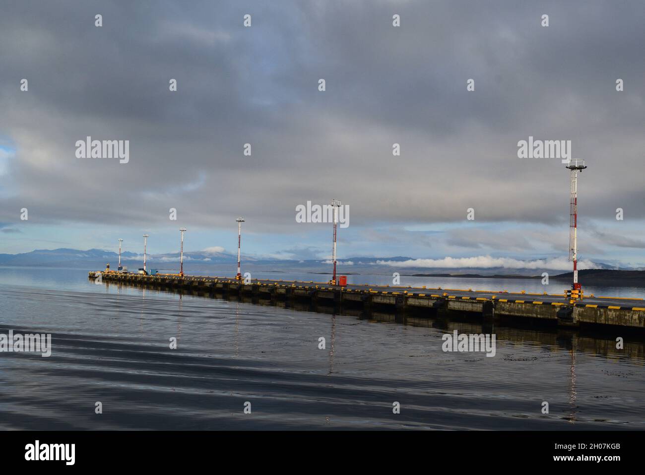 A pier goes into the Beagle Channel in Tierra del Fuego, Argentina ...