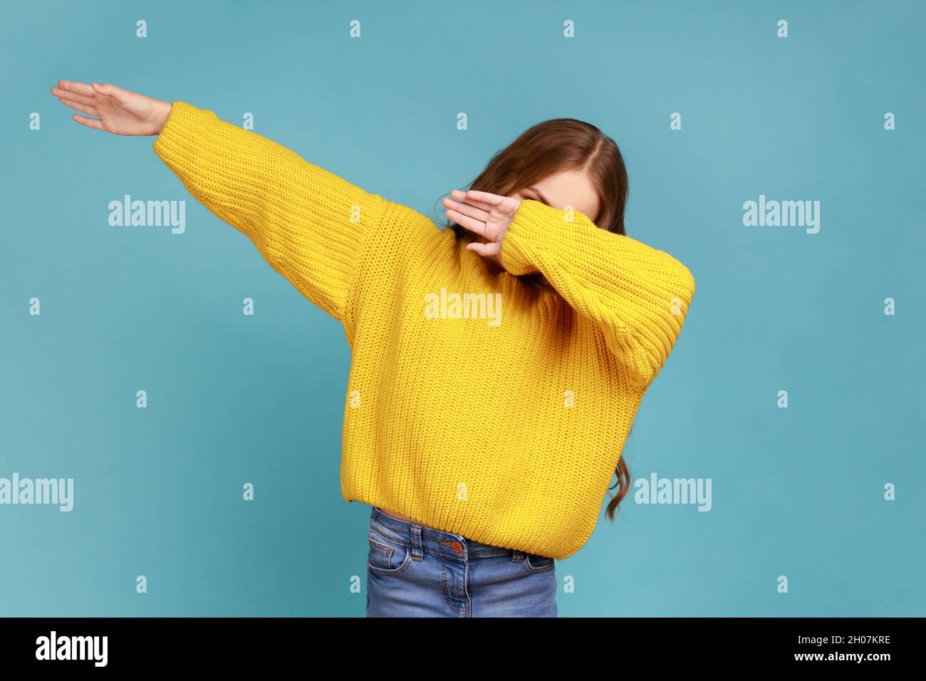 Little girl making dabbing movement, famous internet meme of success ...