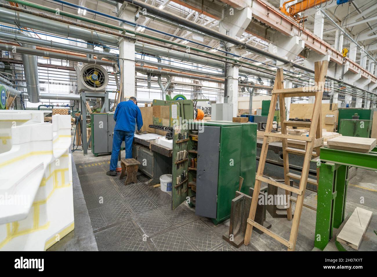 Wood factory workshop, production wooden molds and steel machinery ...