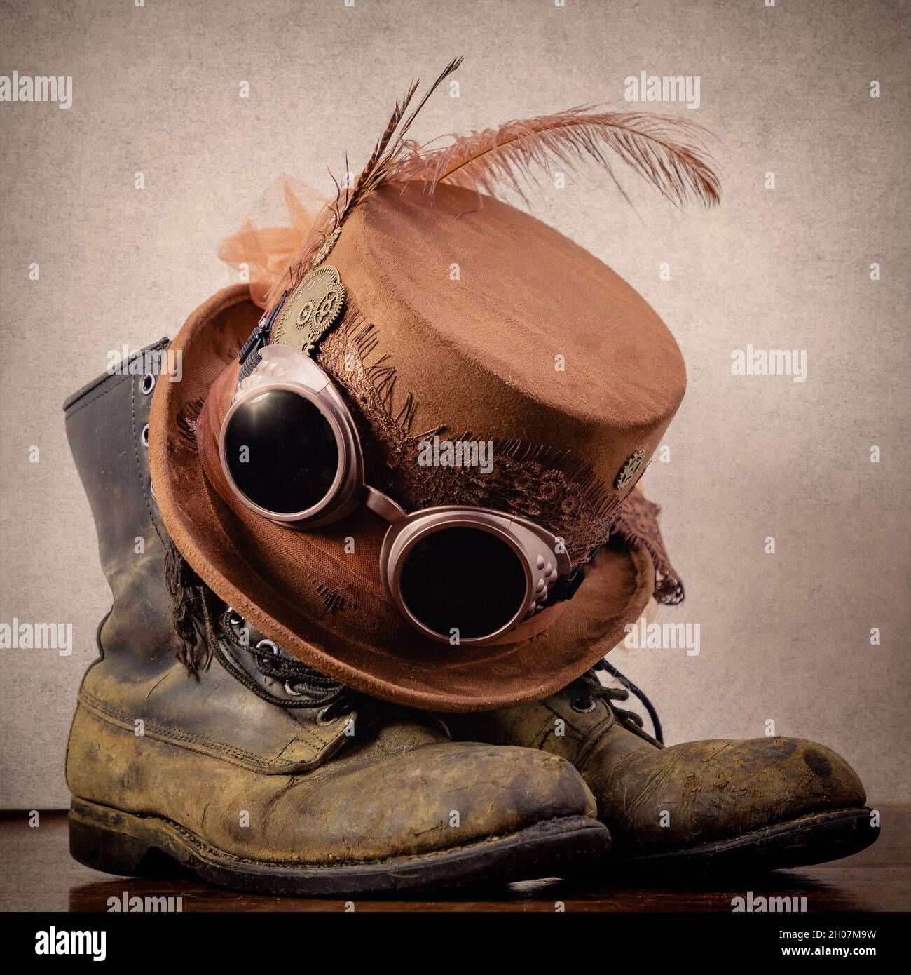 Steampunk Style Top Hat with Goggles and Boots Stock Photo - Alamy