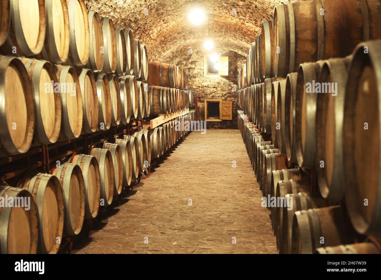 Wine cellar interior with large wooden barrels Stock Photo - Alamy