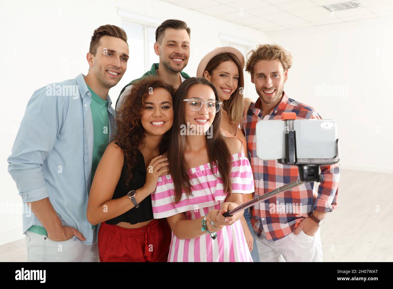 Group of happy young people taking selfie indoors Stock Photo - Alamy Group of happy young people taking selfie indoors Stock Photo - Alamy