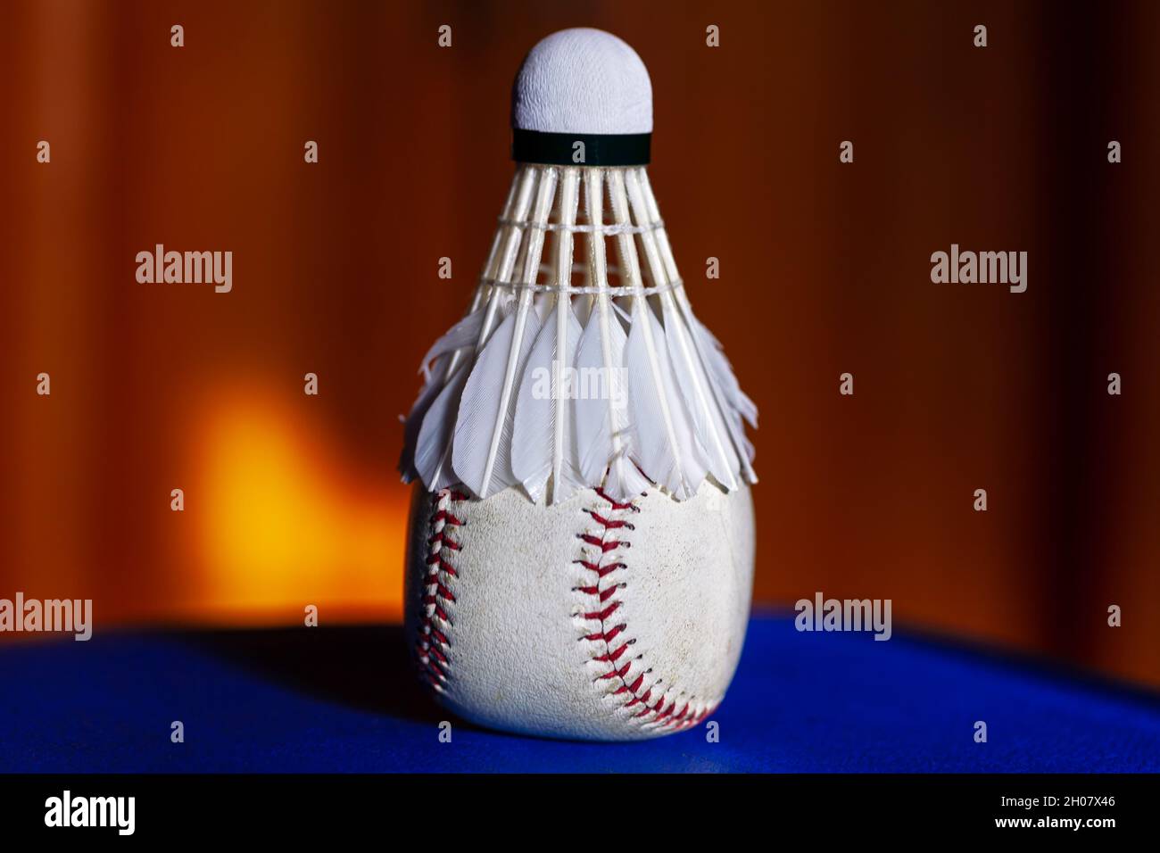 Shuttlecock and baseball ball . Funny sport moment Stock Photo - Alamy