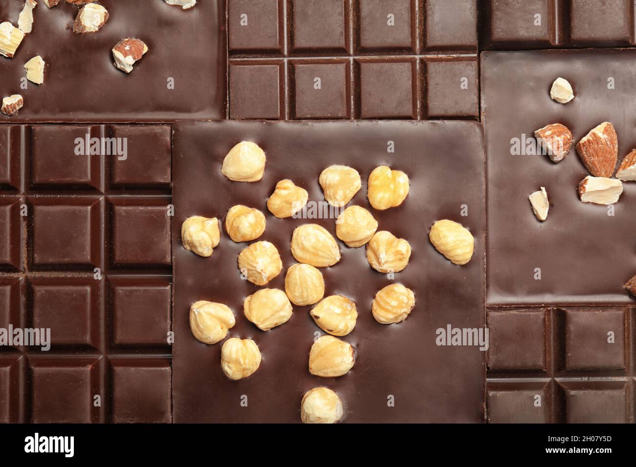 Different delicious black chocolate bars as background Stock Photo - Alamy