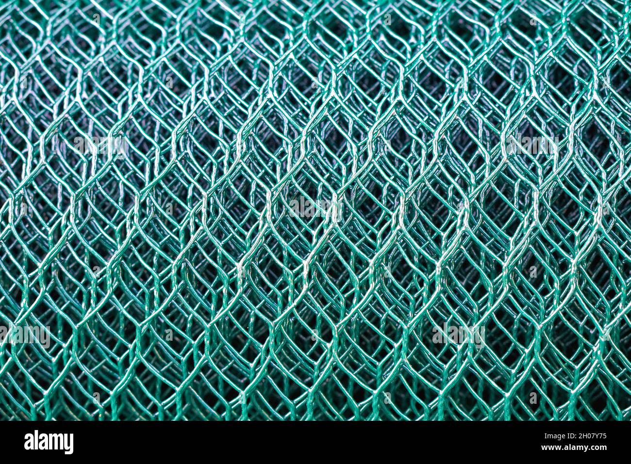 Roll of steel mesh chicken wire material Stock Photo - Alamy