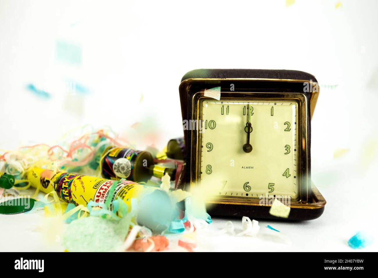 Vintage Alarm Clock with Party Confettii Stock Photo - Alamy
