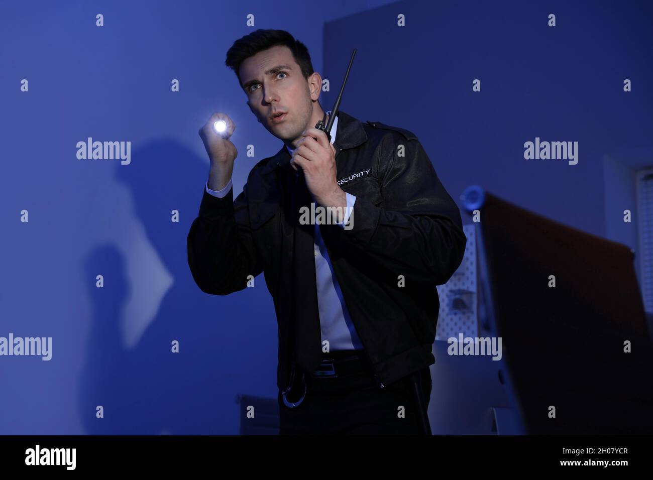 Officer using flashlight hi-res stock photography and images - Alamy