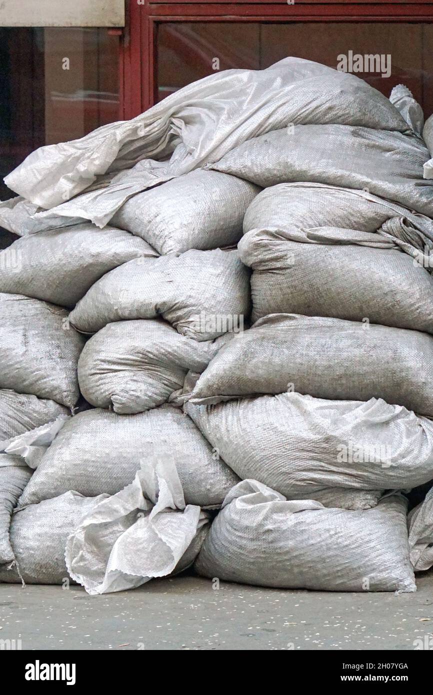 Big stack of sacks protection and prevention from river water floods ...
