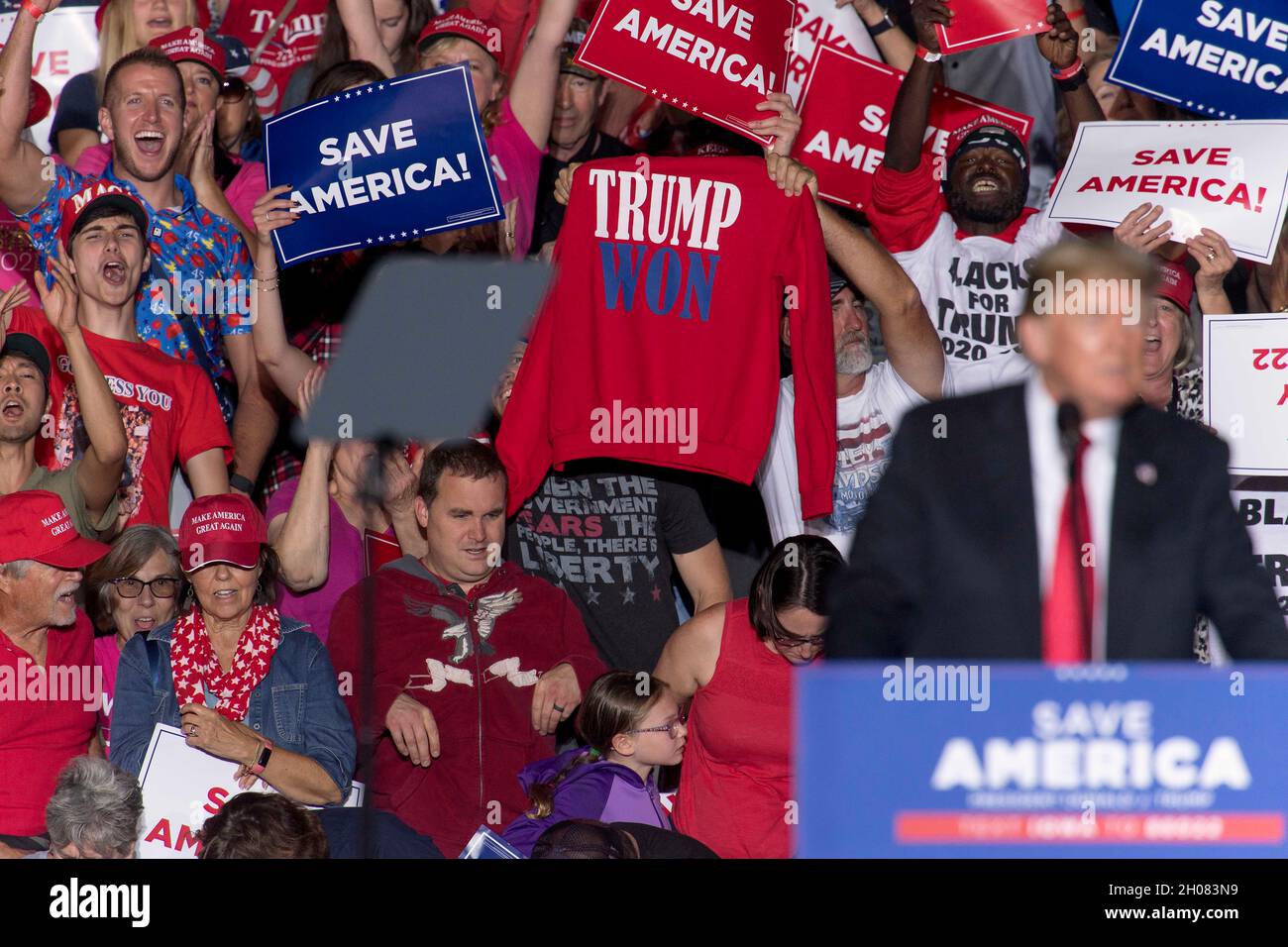 Des Moines, Iowa, USA. 9th Oct, 2021. Supporters hold signs and a red ...