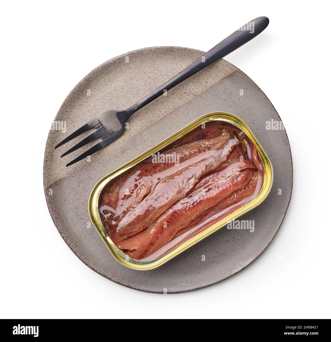 canned anchovy fillets on ceramic plate isolated on white background ...