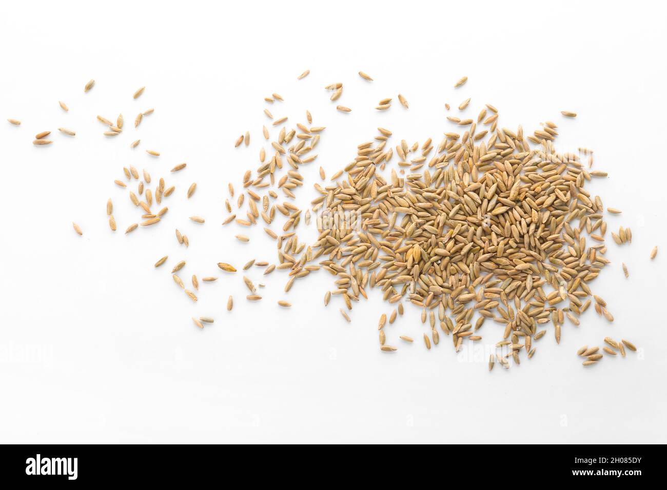 Raw rye on white background. Healthy grains and cereals Stock Photo - Alamy