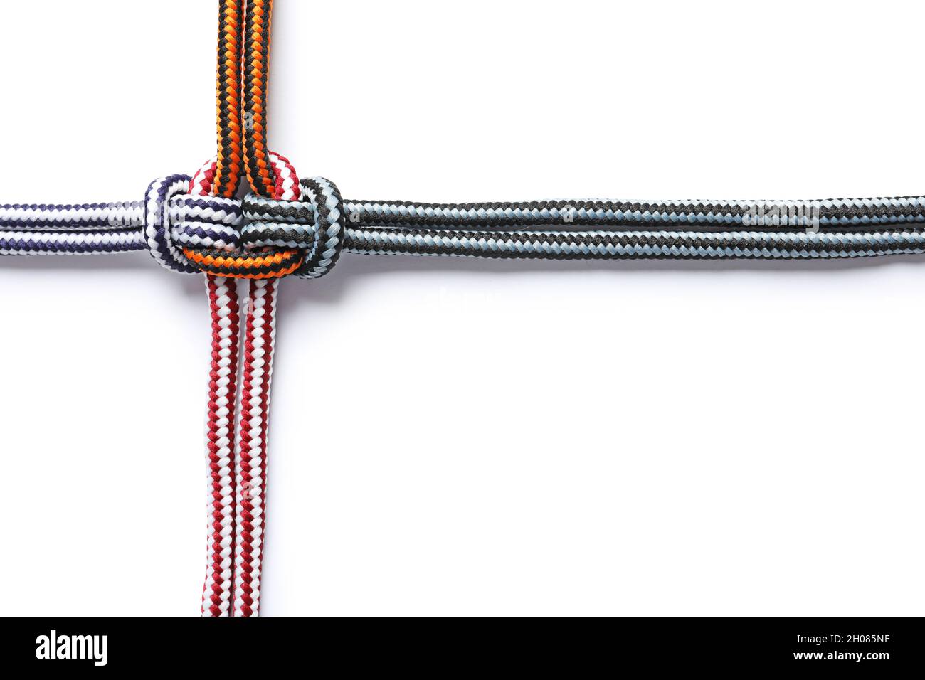 Colorful ropes tied together on white background. Unity concept Stock ...