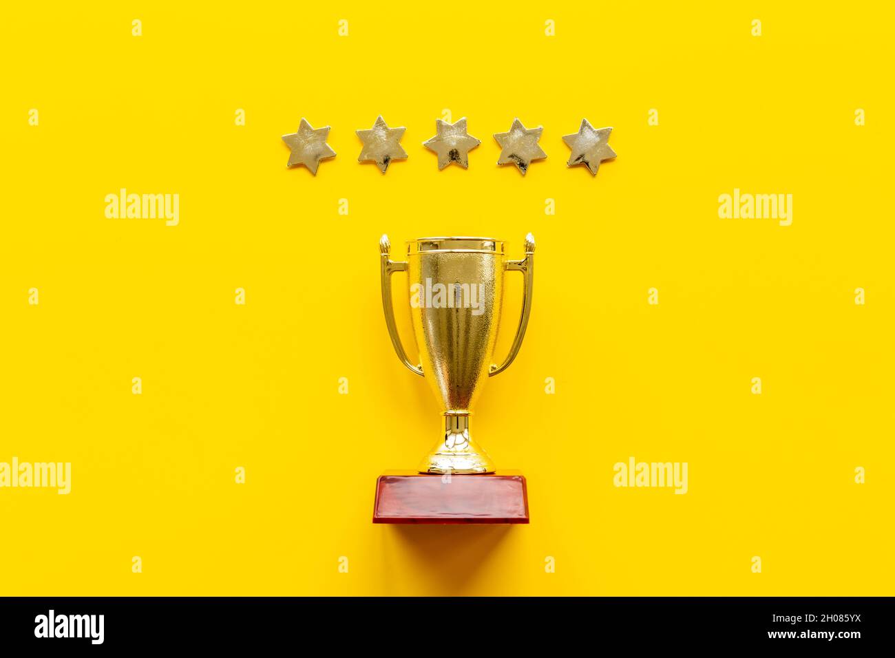 Five stars rating and winner trophy cup. Award and success concept ...