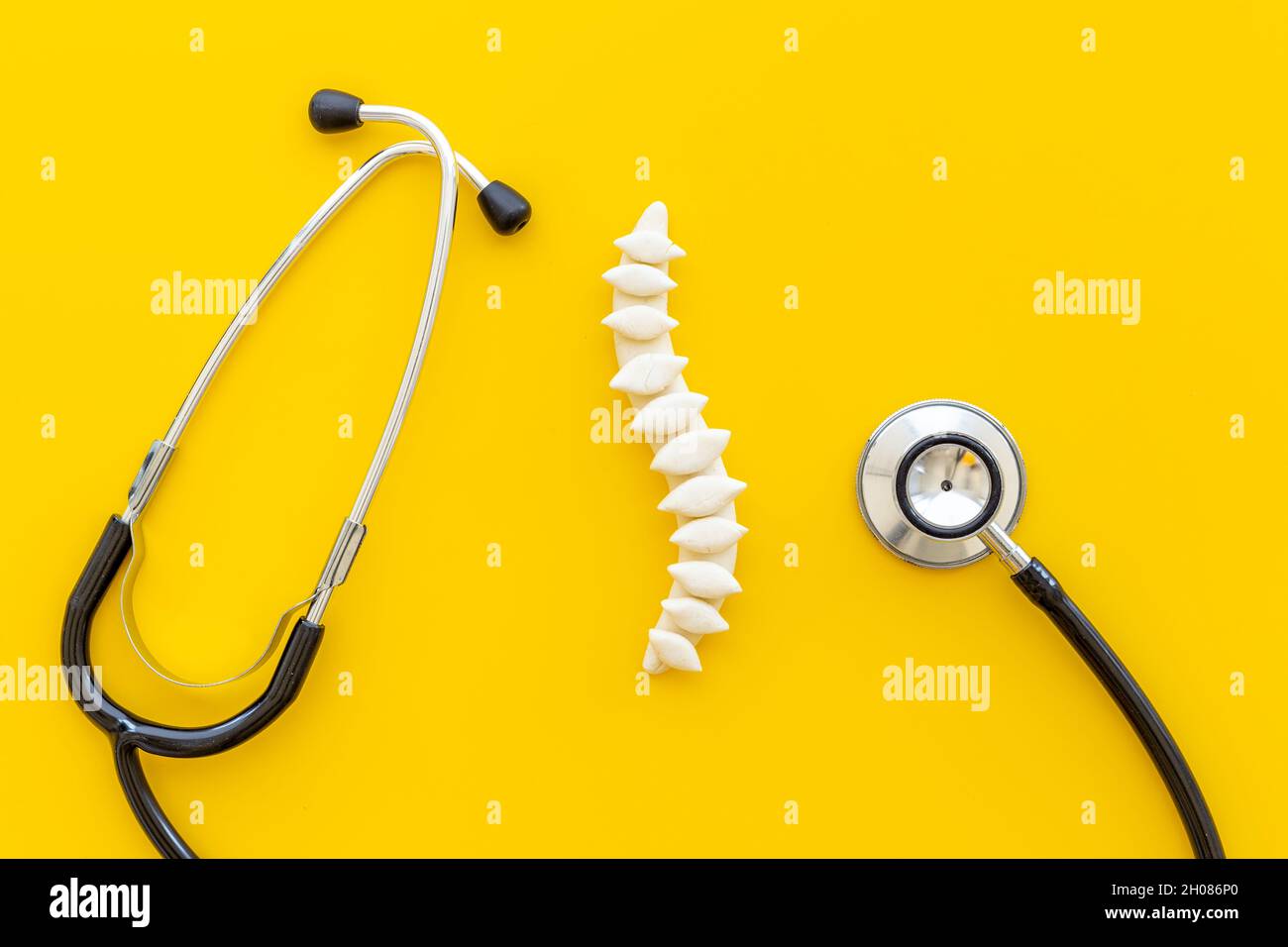 Treatment of osteochondrosis - medical spine model with stethoscope ...