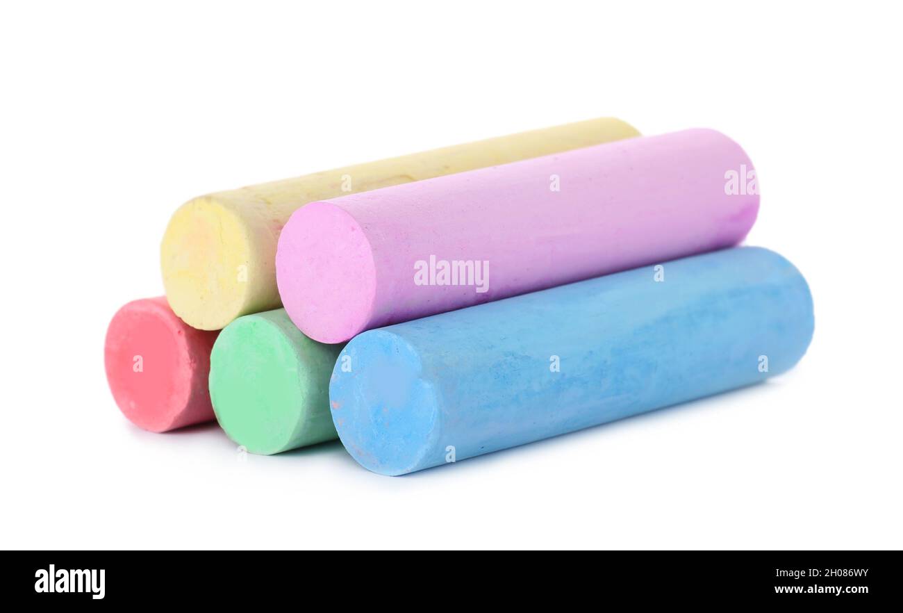 Color pieces of chalk on white background Stock Photo - Alamy