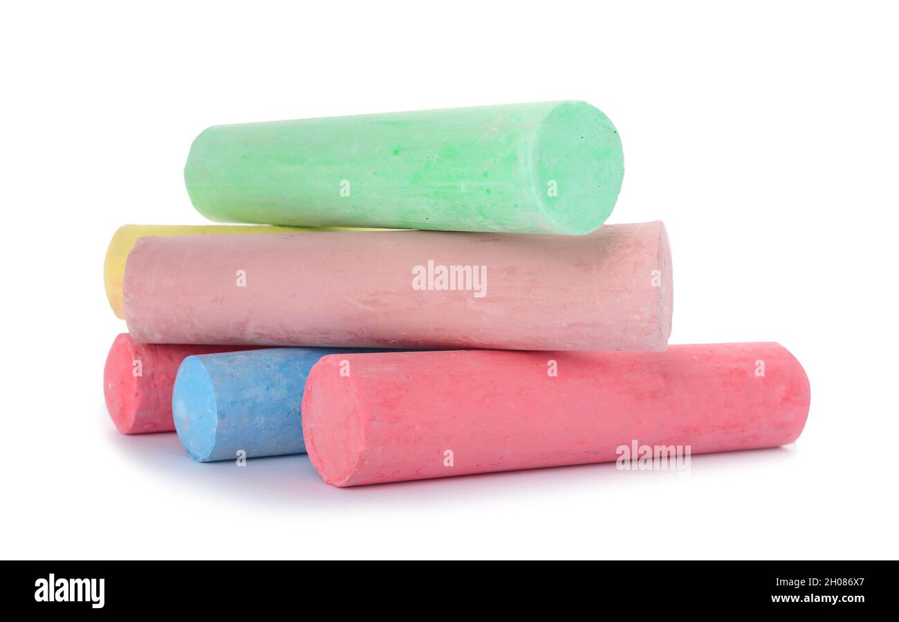 Color pieces of chalk on white background Stock Photo - Alamy