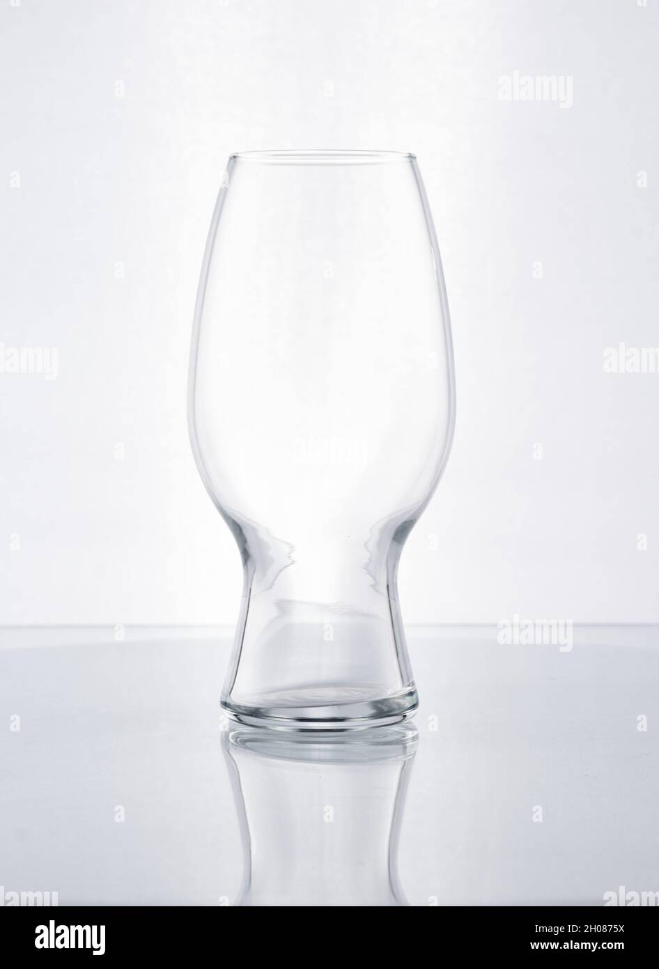 Shaped glass jug for Chinese tea on a white background Stock Photo - Alamy