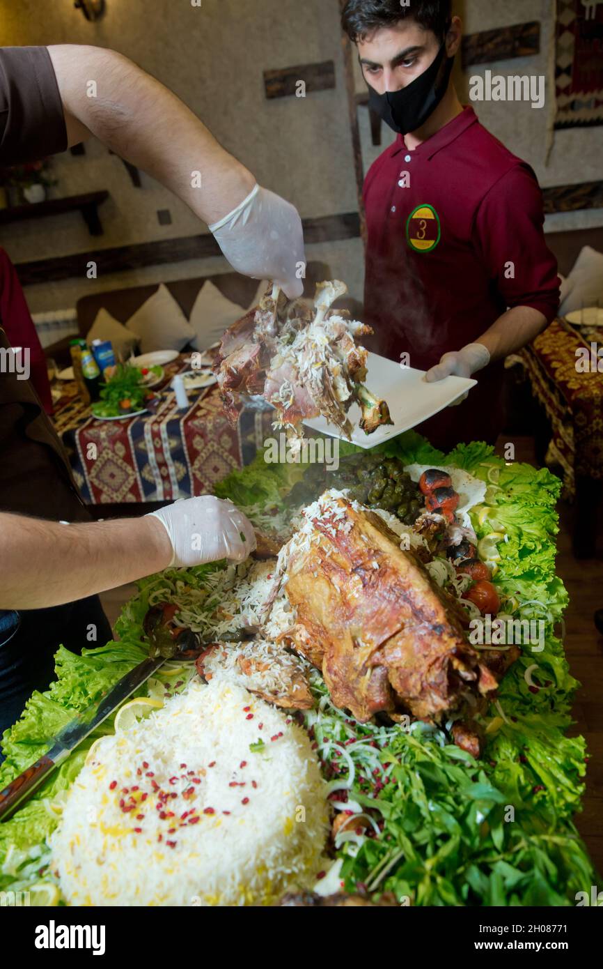 Barbecue is prepared of lamb or sheep meat and processed by slasher ...