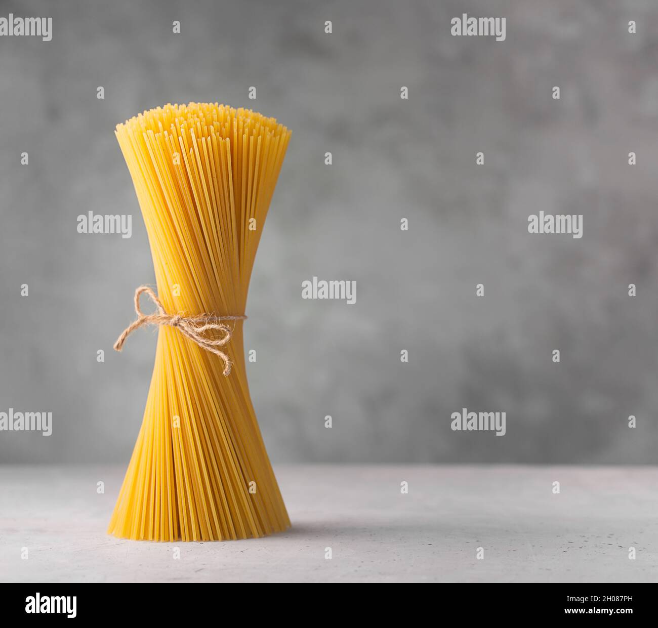 Raw spaghetti. Dry italian pasta prepared from durum wheat, gray ...