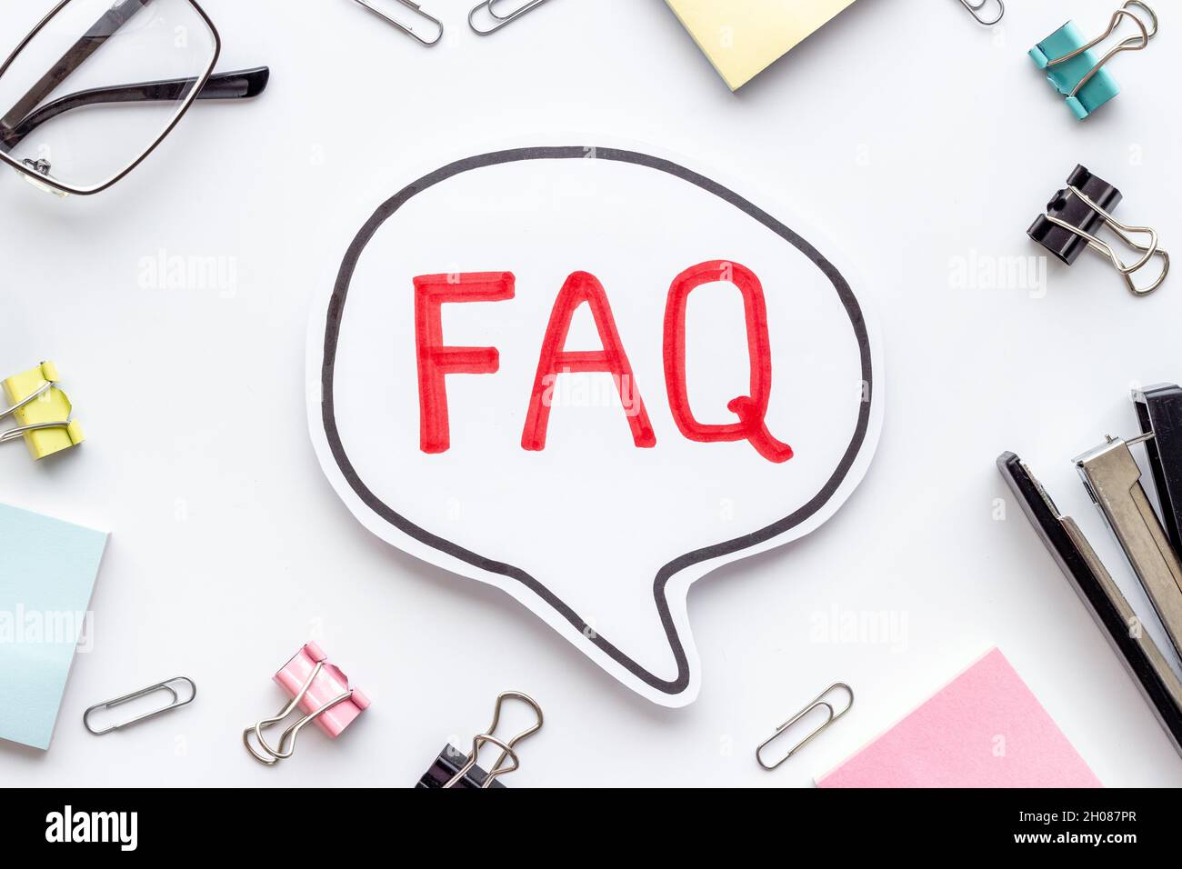 Word faq frequently asked questions with stationery on working place ...
