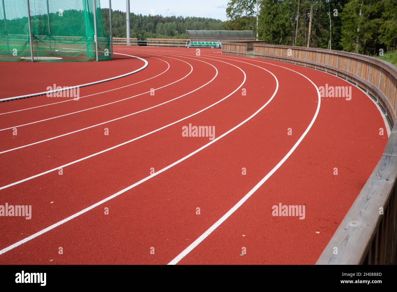 Running track in an outdoor stadium Stock Photo - Alamy