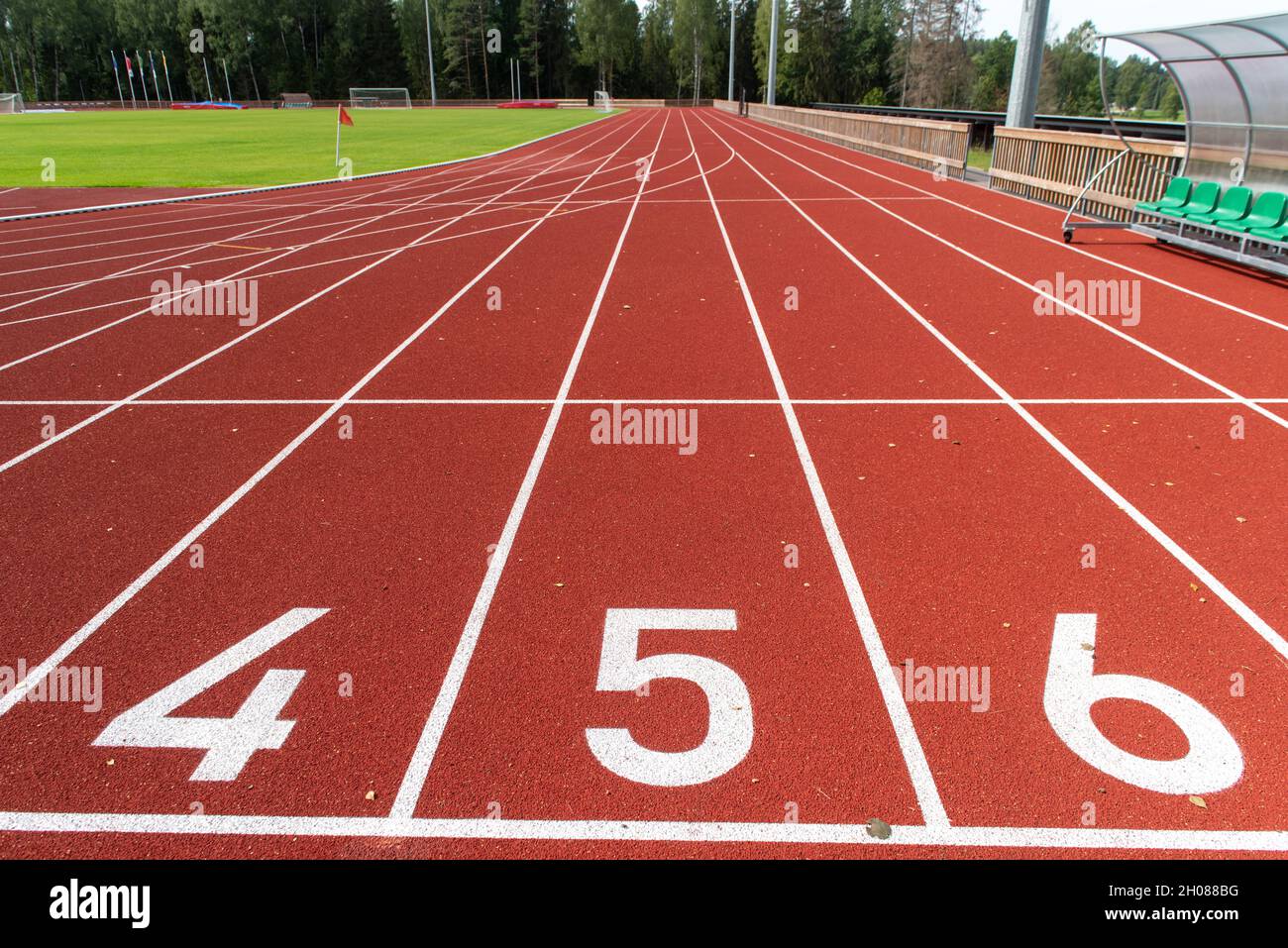 Running track in an outdoor stadium Stock Photo - Alamy