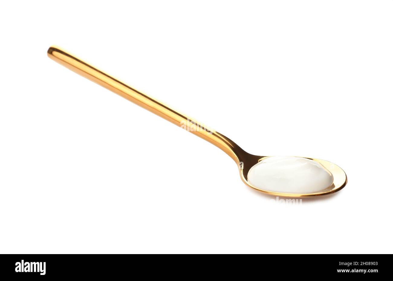 Spoon with yummy yogurt on white background Stock Photo - Alamy