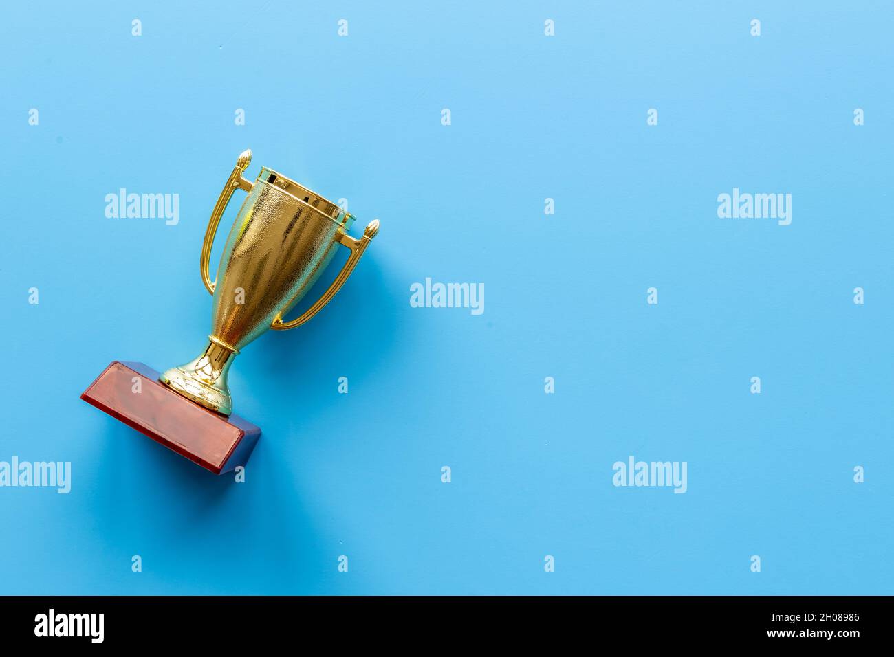 Champion award - golden trophy cup for winner, top view Stock Photo - Alamy