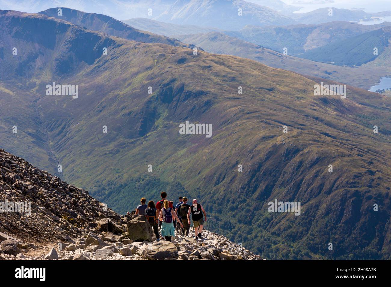 BEN NEVIS, SCOTLAND - SEPTEMBER 01 2021: Hikers making their way up the ...