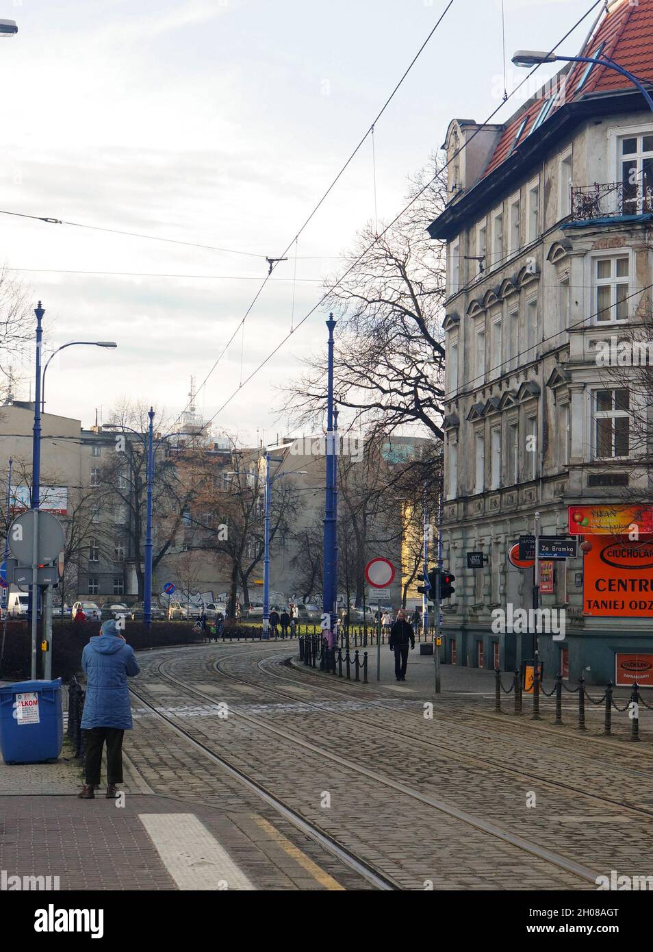POZNAN, POLAND - Jan 31, 2016: A gloomy day and tram rails in the center of the city on a cloudy ...